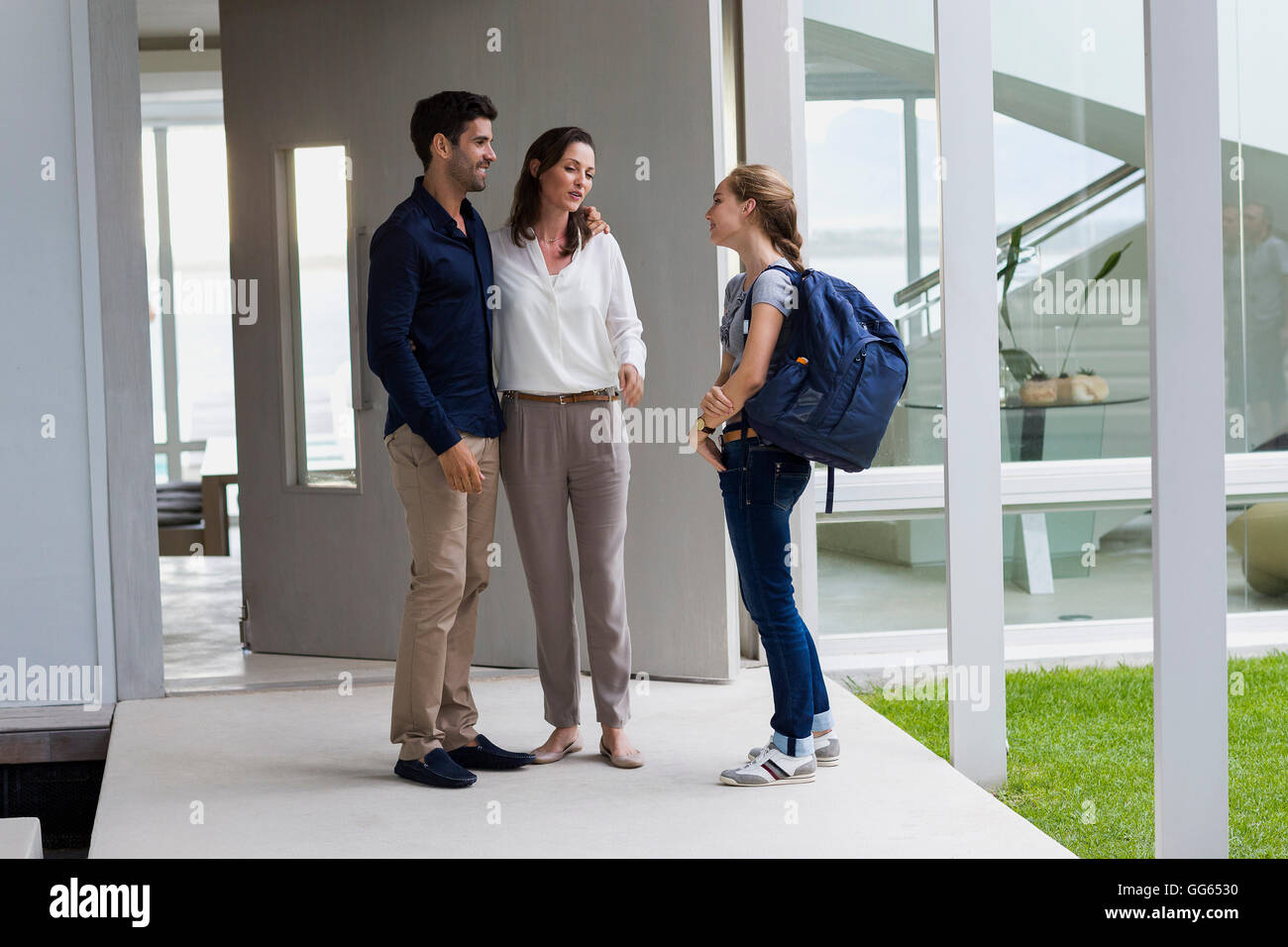 Teenage girl talking to her parents Stock Photo - Alamy