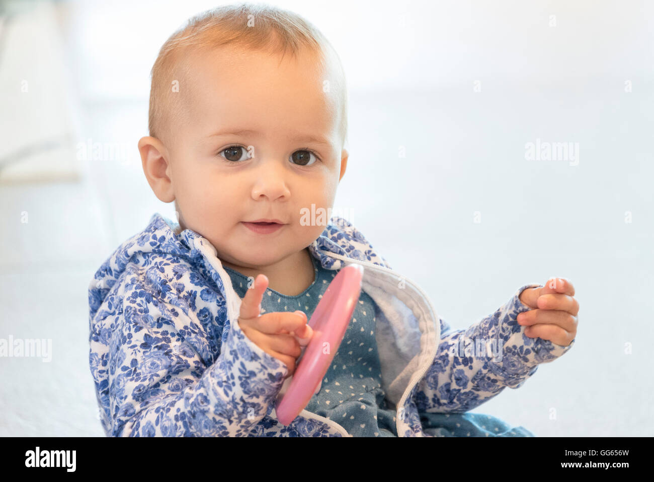 Close up baby girl sitting on hi-res stock photography and images - Alamy