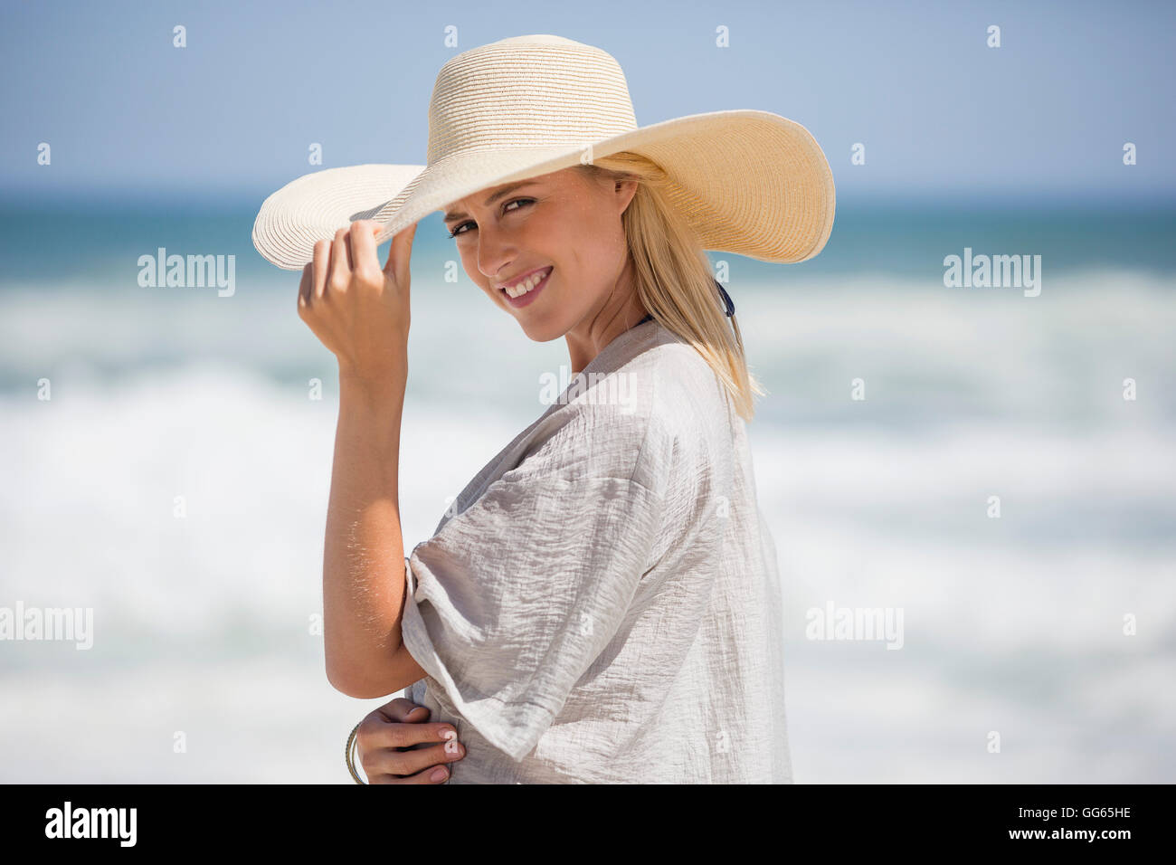 Woman Wearing Sunhat On Beach High Resolution Stock Photography and ...