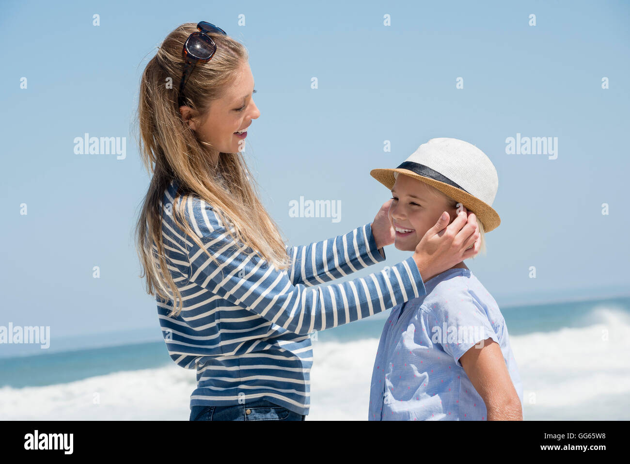 Putting a hat hi-res stock photography and images - Alamy