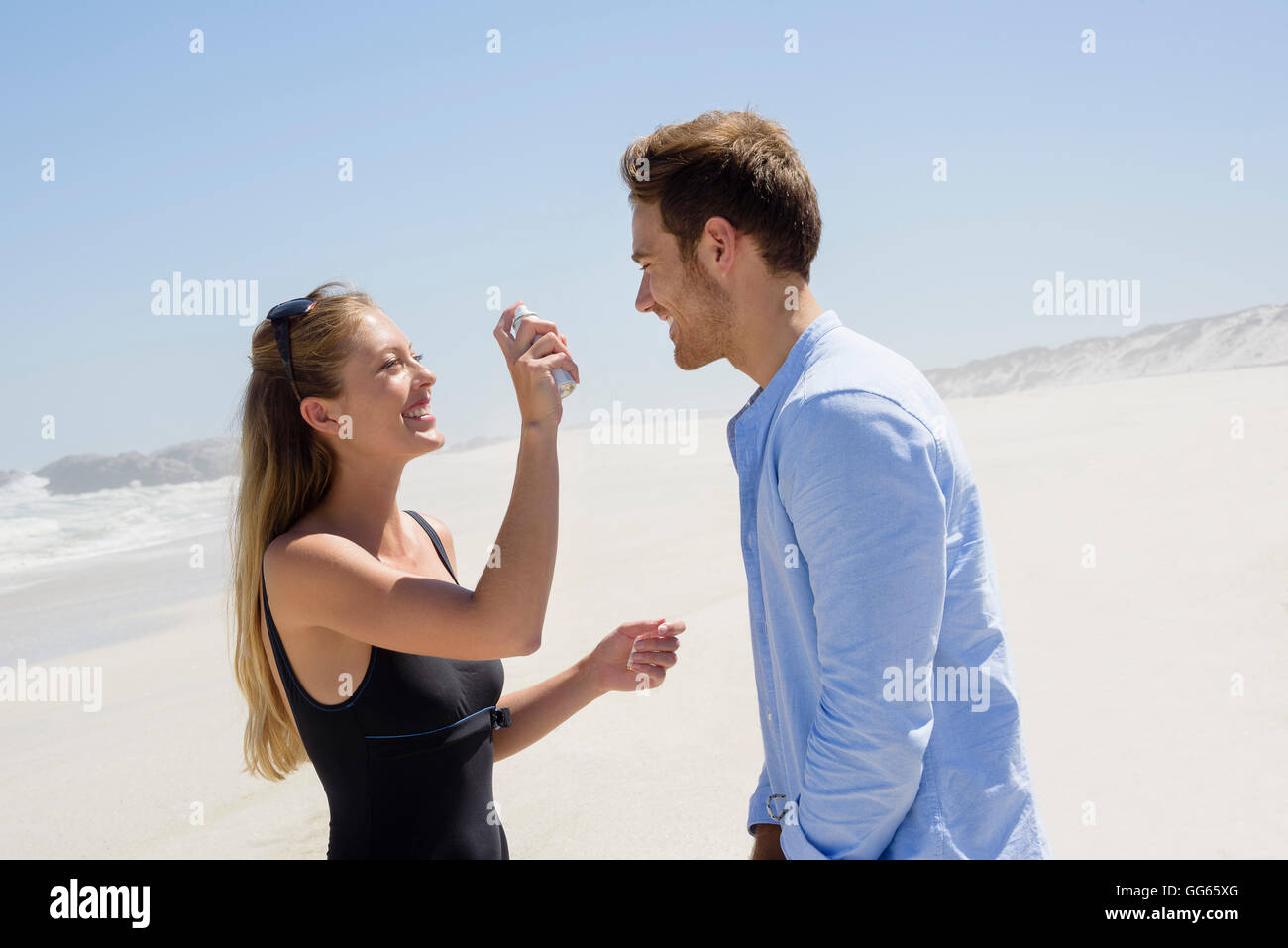 Suntan Lotion Couple Stock Photos & Suntan Lotion Couple Stock Images ...