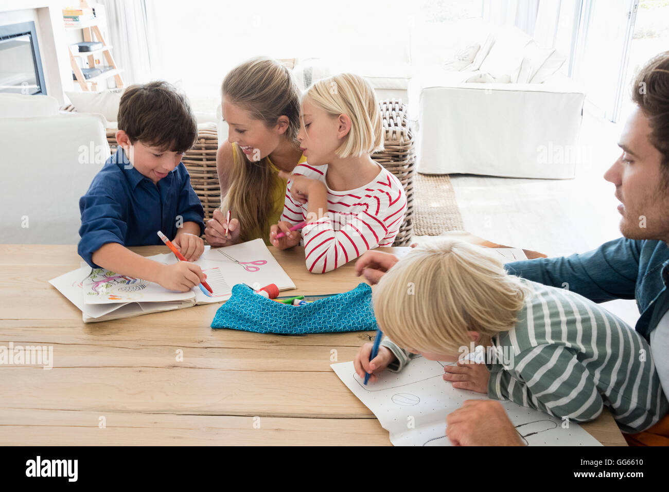 Children with parents learning hi-res stock photography and images - Alamy