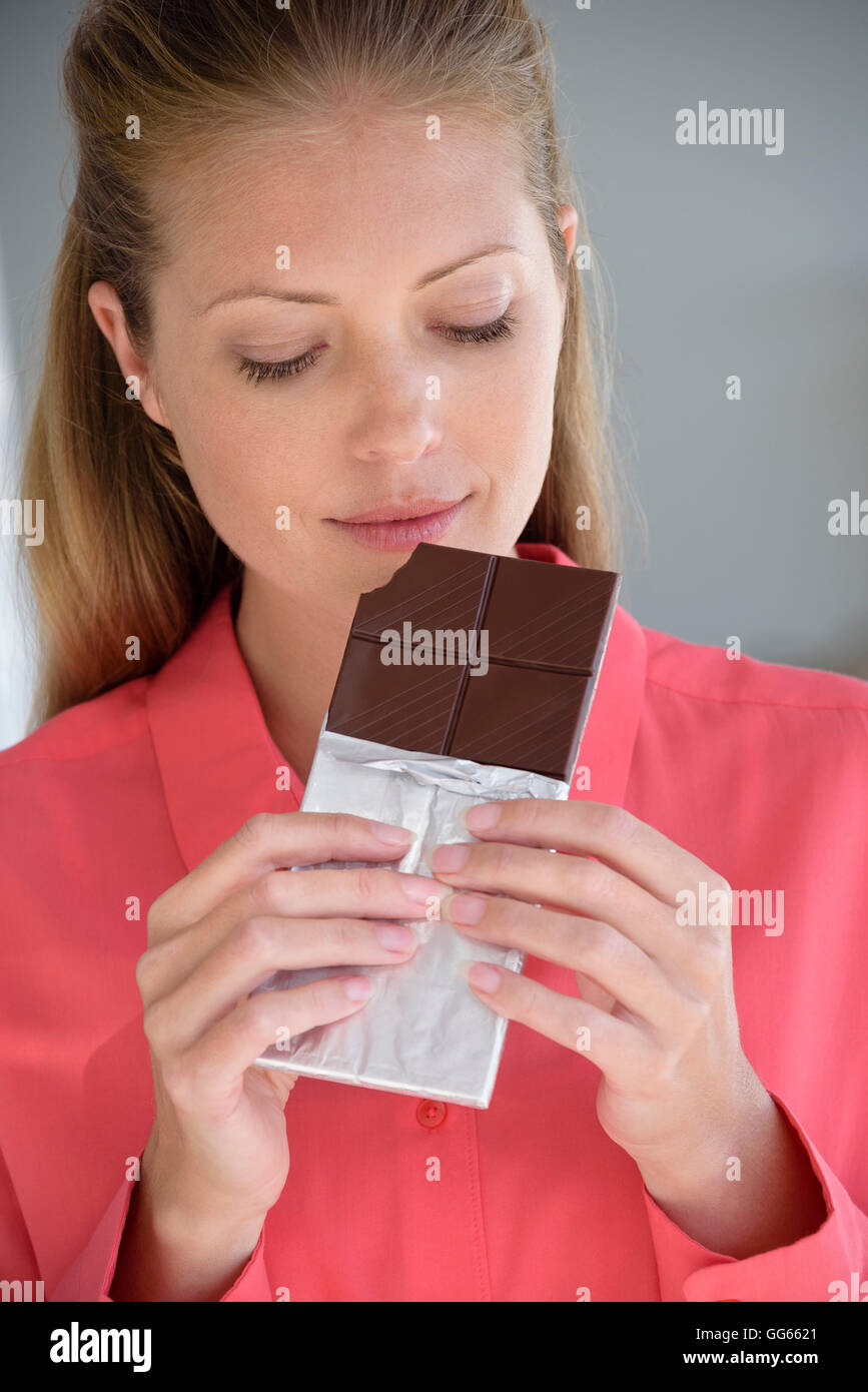 Eating chocolate and female bar hi-res stock photography and images - Alamy