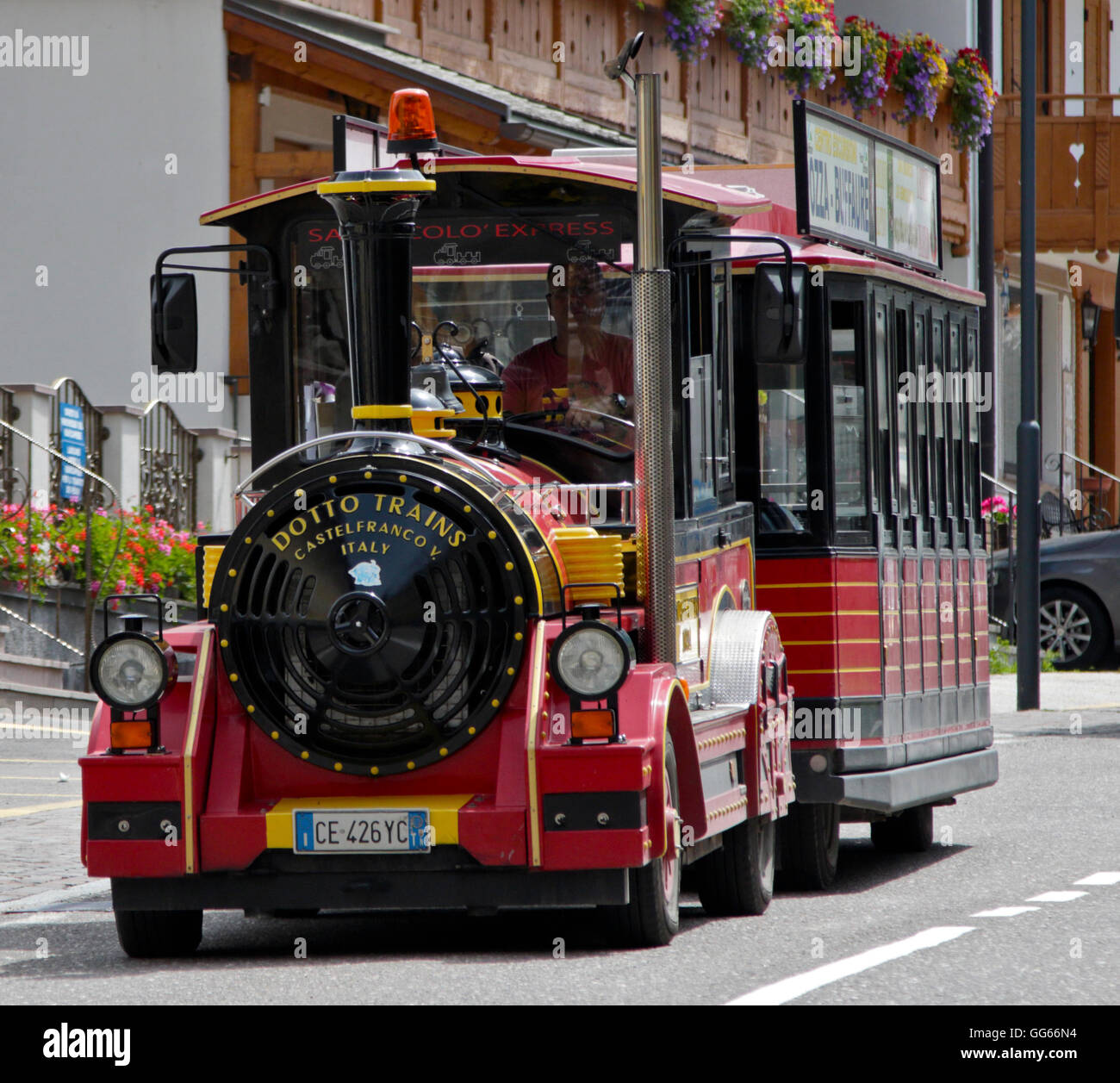 Dotto Trains road train in Pozza di Fassa, Italy Stock Photo - Alamy
