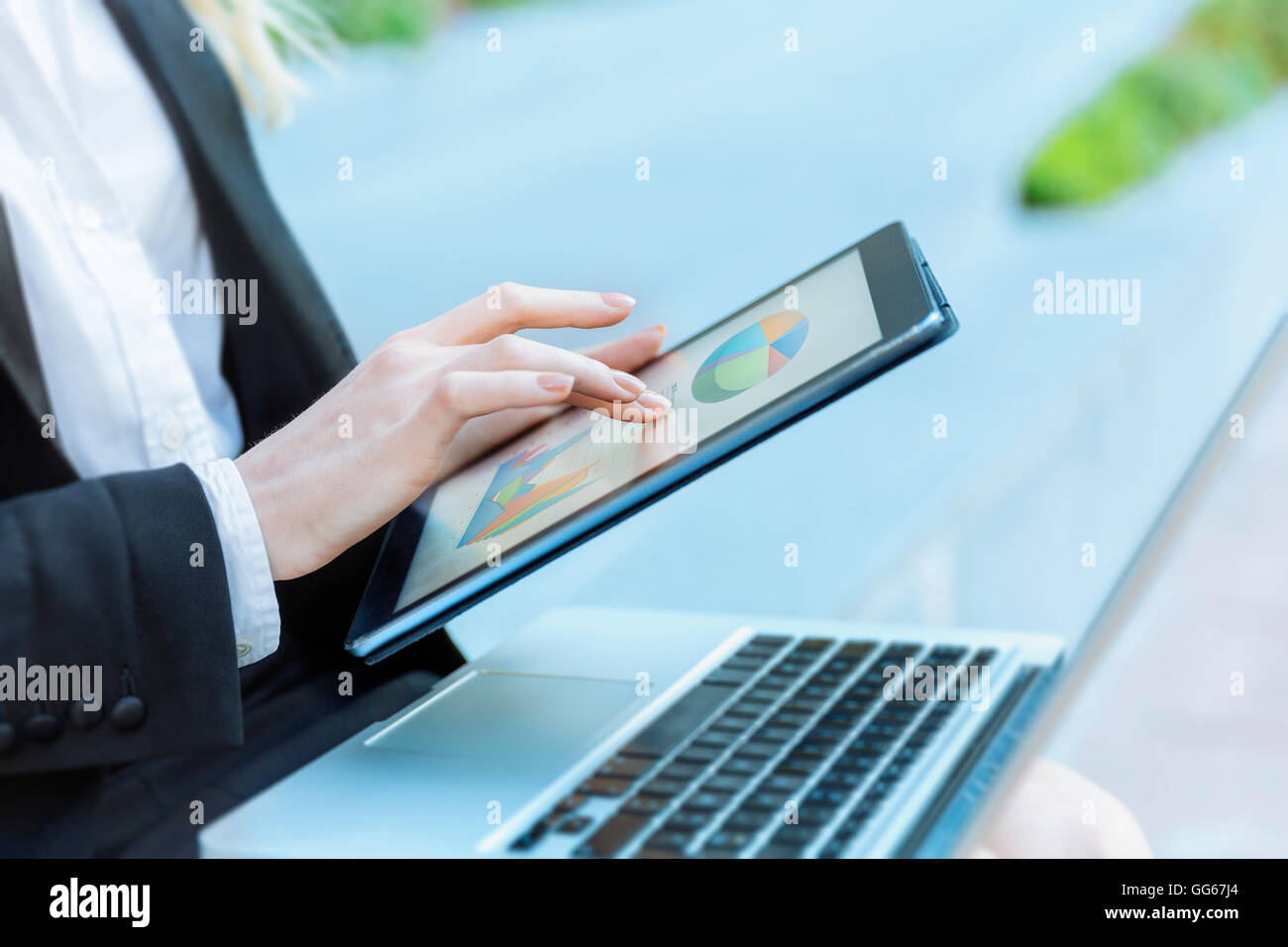 Using tablet business people network hi-res stock photography and ...