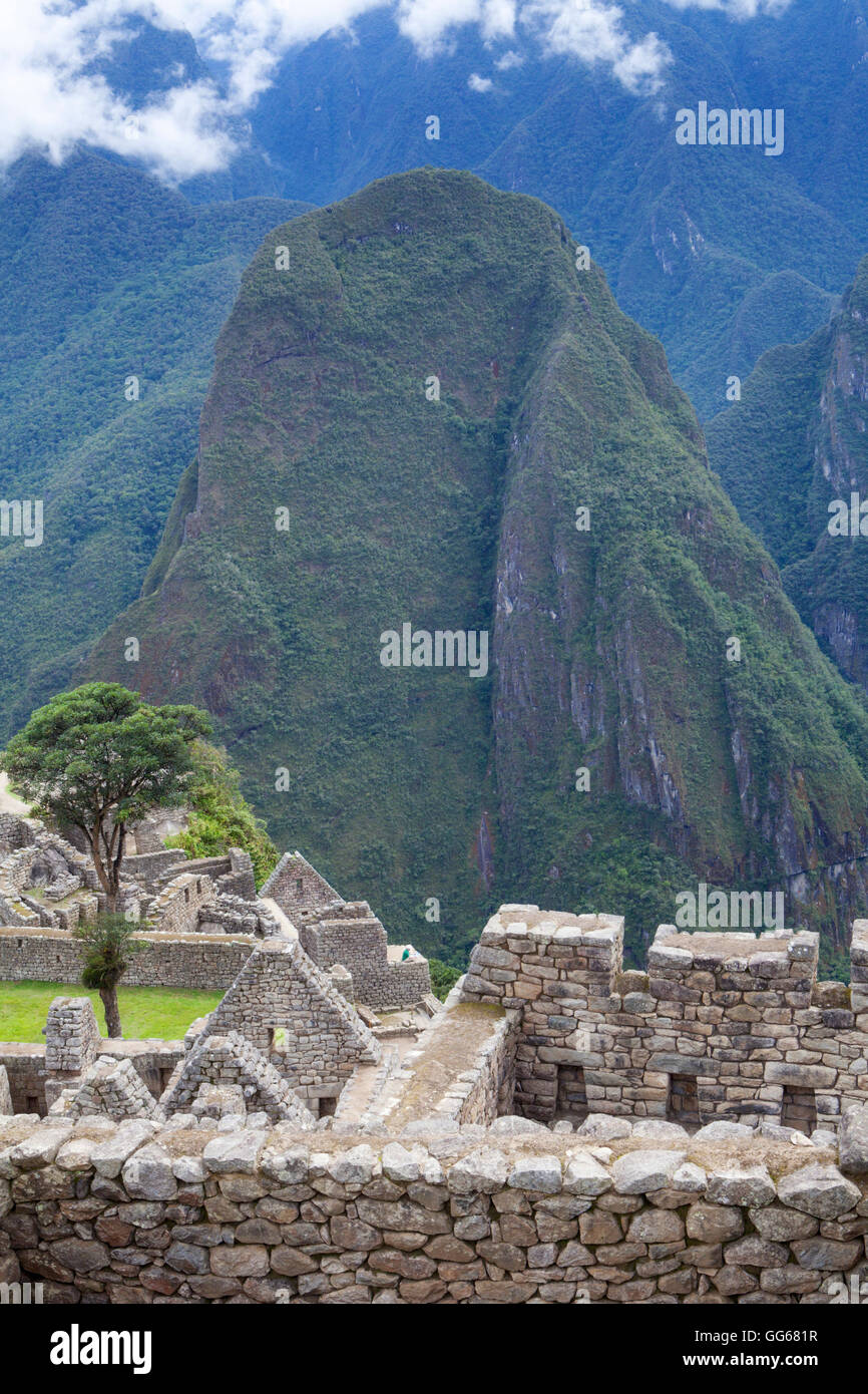 Inca stone houses at Machu Picchu in Peru Stock Photo - Alamy