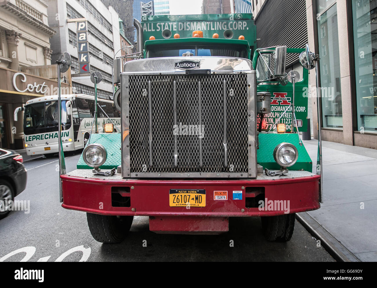 Large green garbage truck parked in the streets of Manhattan Stock ...