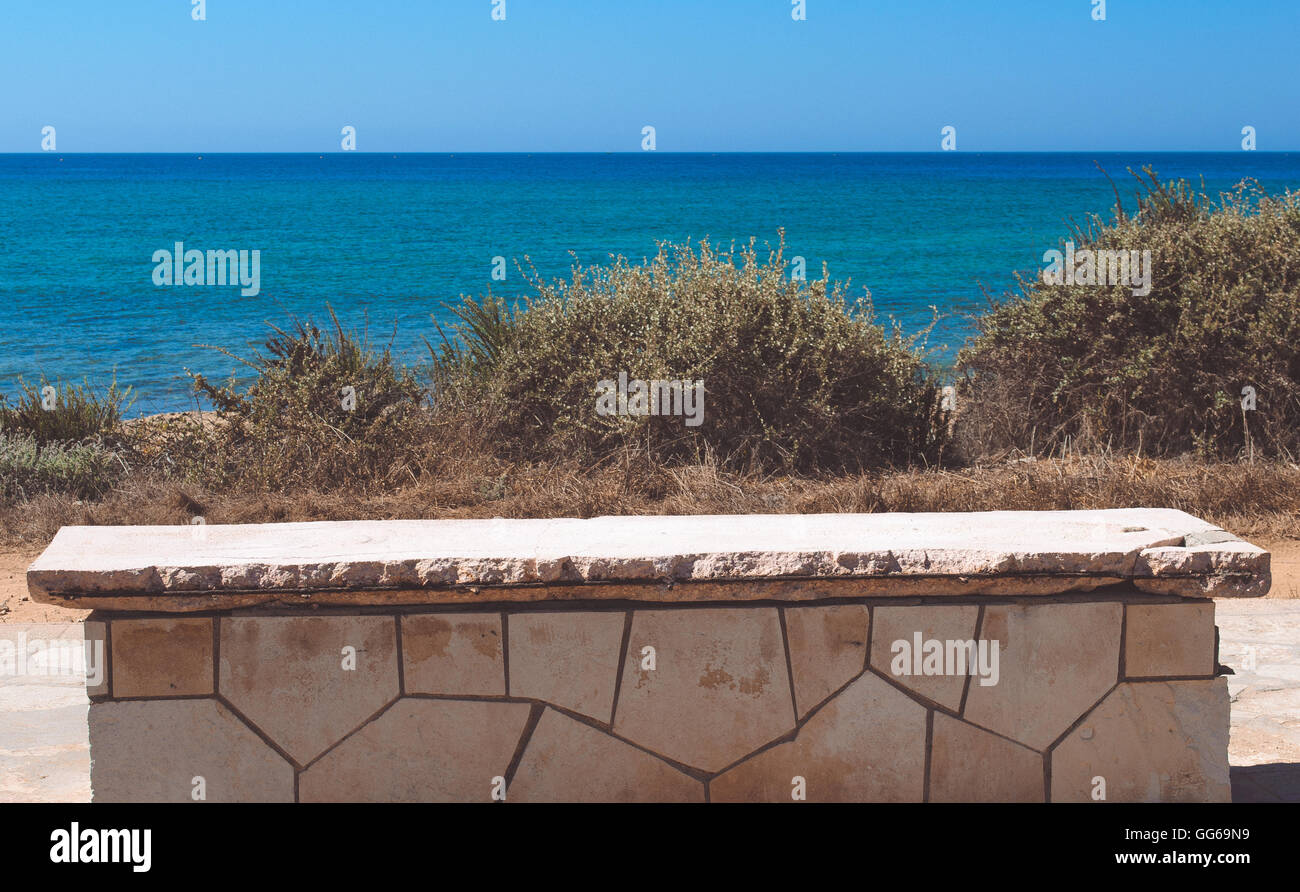 Bench by the sea Stock Photo - Alamy