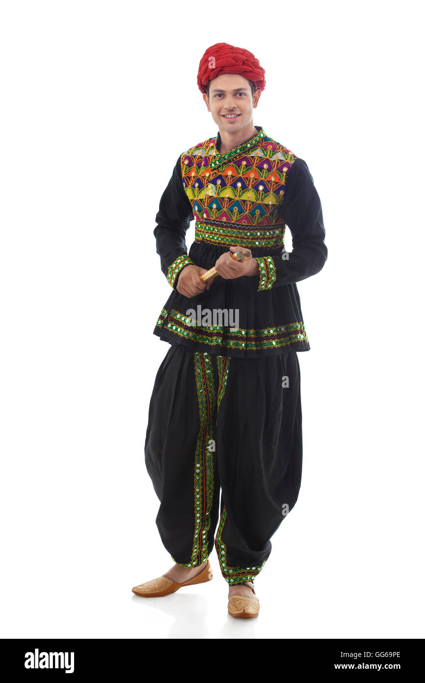 Portrait of a male dandiya dancer Stock Photo - Alamy