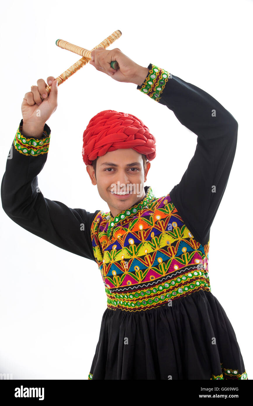 Male dandiya dancer dancing sticks hi-res stock photography and images ...