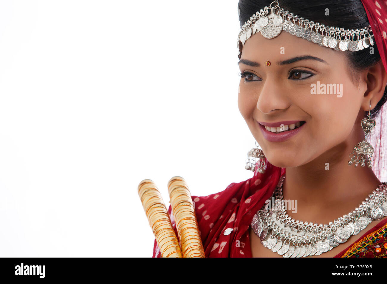 Female dandiya dancer with sticks Stock Photo - Alamy