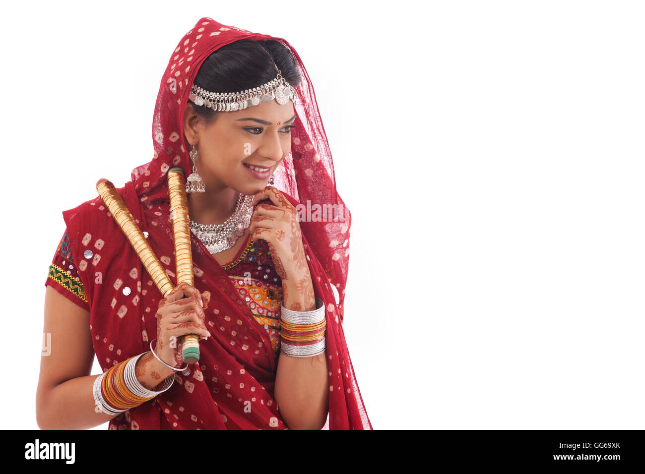 Female dandiya dancer with sticks Stock Photo - Alamy