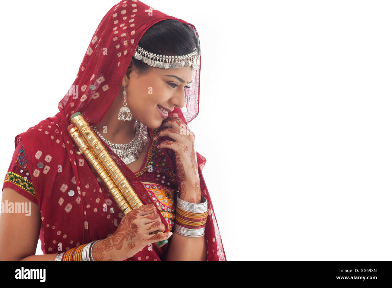 Female dandiya dancer with sticks Stock Photo - Alamy