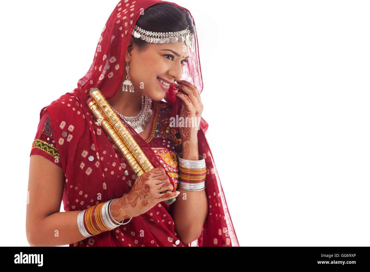 Female dandiya dancer with sticks Stock Photo - Alamy
