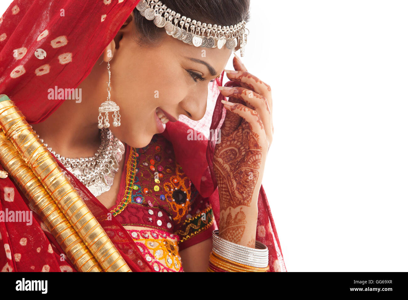 Female dandiya dancer with sticks Stock Photo - Alamy