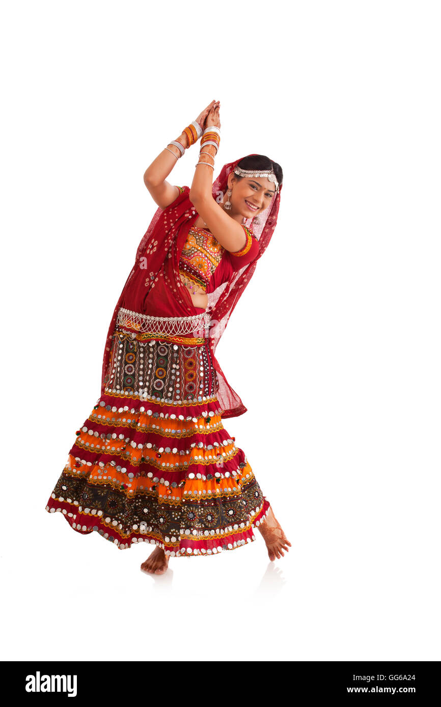 Female dandiya dancer dancing Stock Photo - Alamy