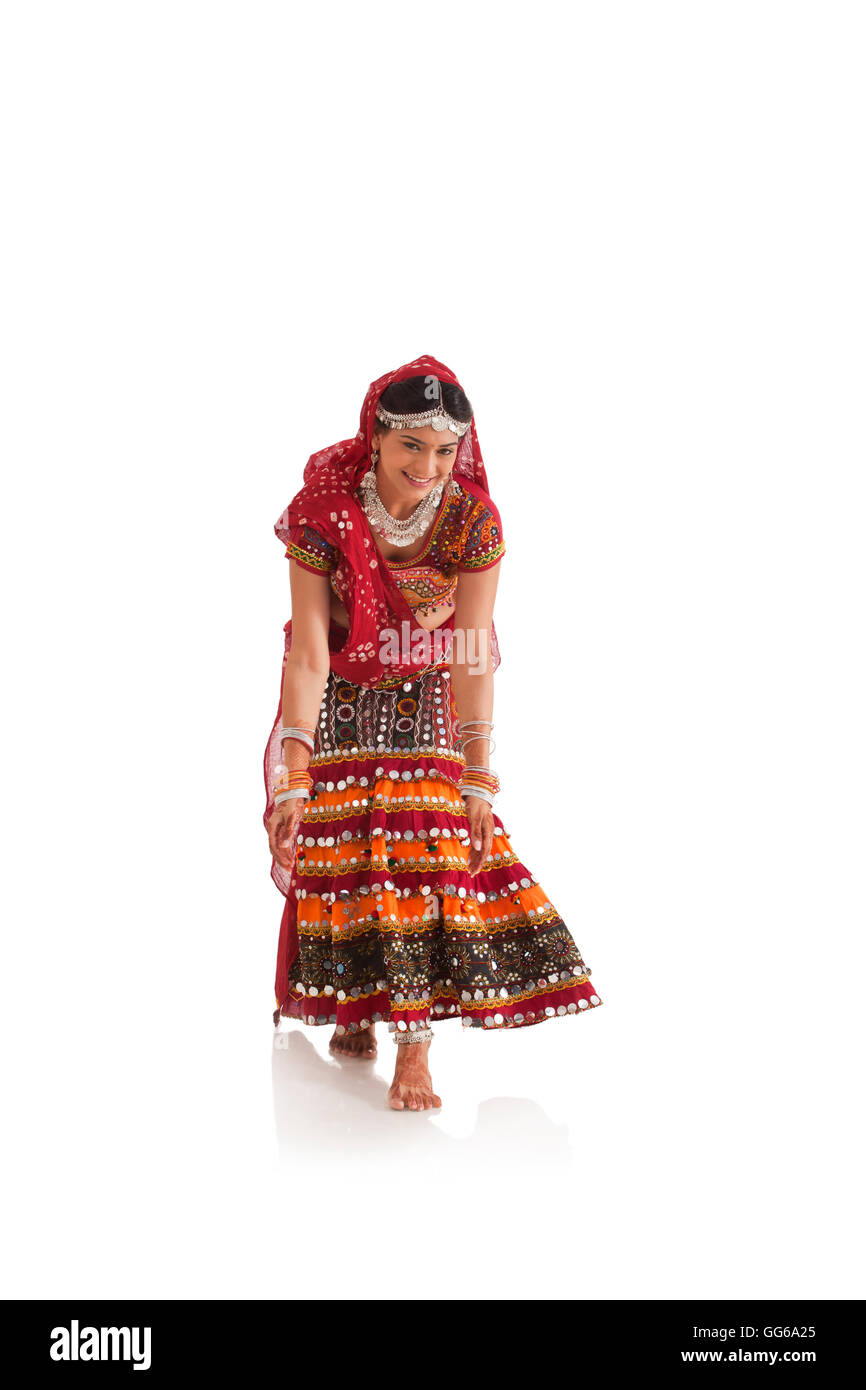 Female dandiya dancer dancing Stock Photo - Alamy