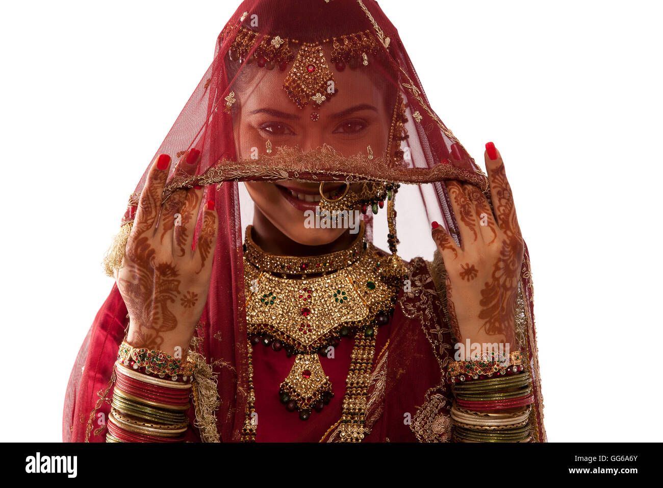 Gujarati brides face hidden behind a veil Stock Photo - Alamy