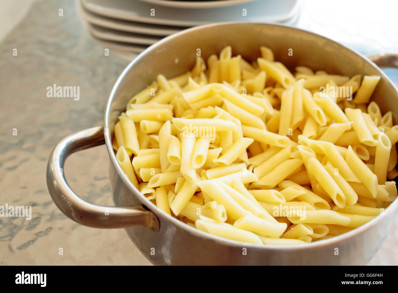 macaroni steamed in a metal pot Stock Photo - Alamy