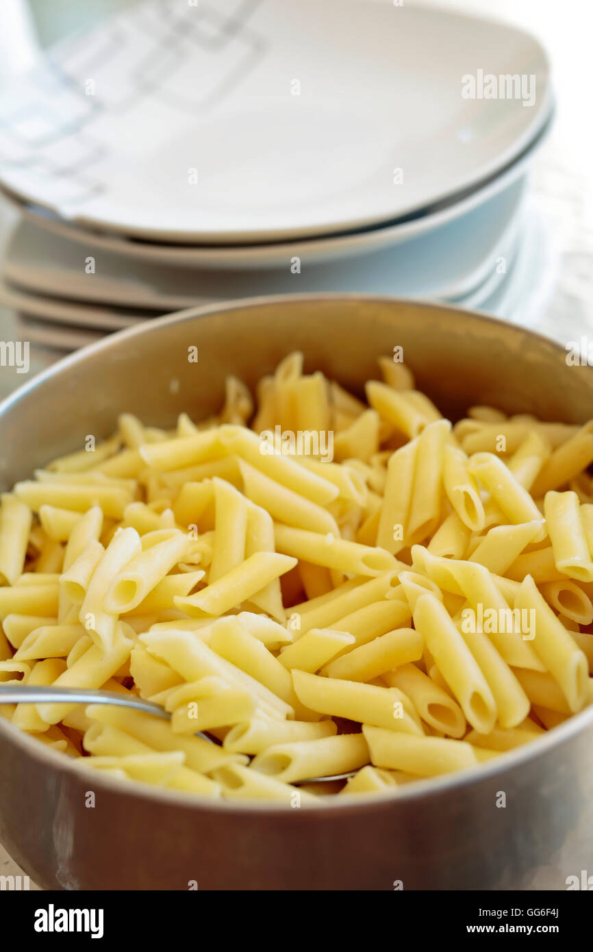 macaroni steamed in a metal pot Stock Photo - Alamy