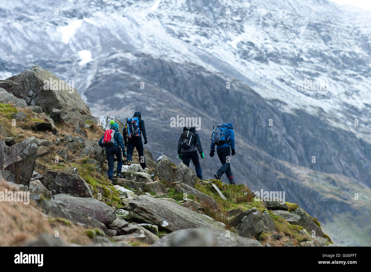 Hikers set off from Pen Y Pass in winter to climb Mount Snowdon in ...