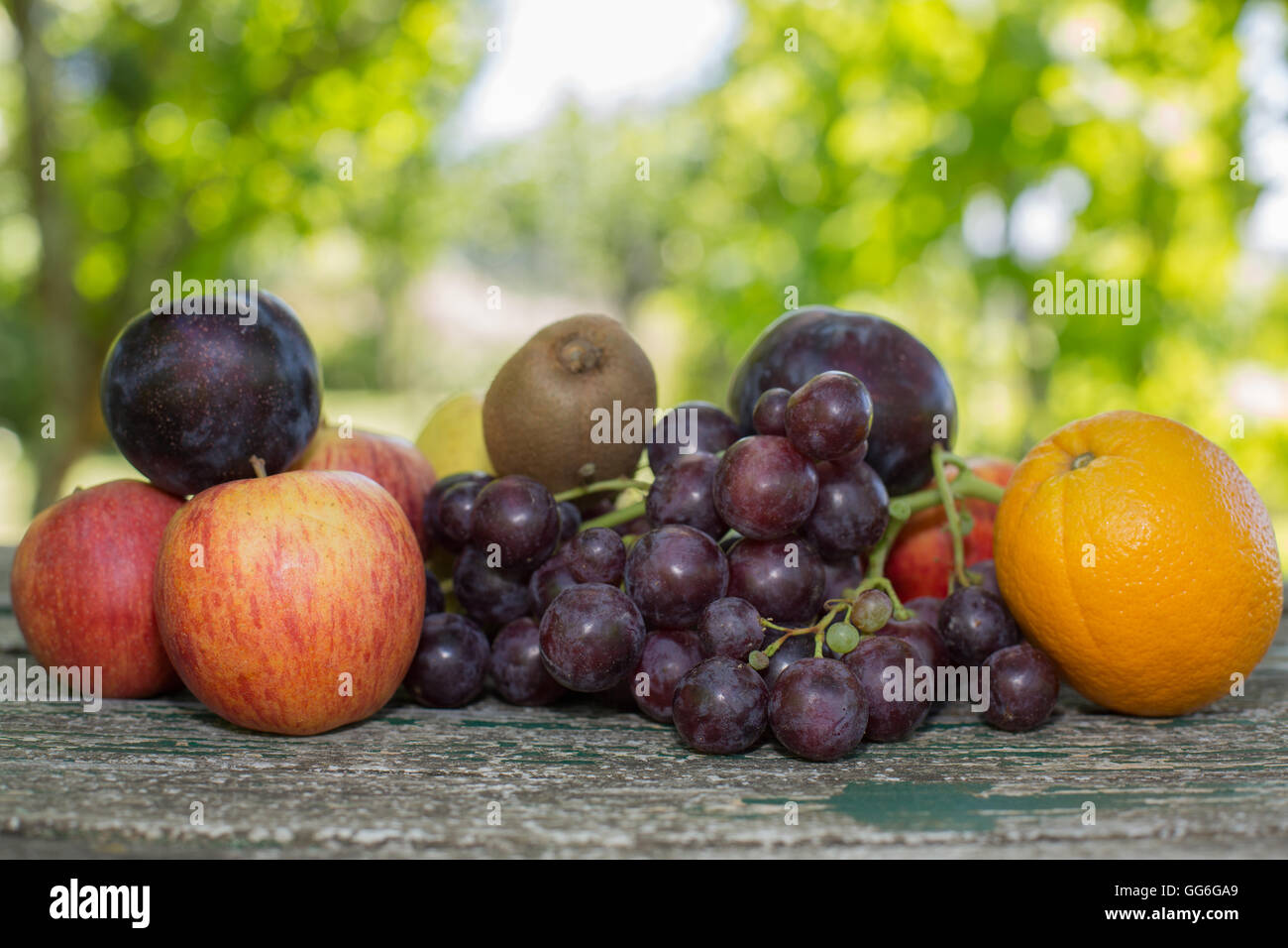 fruits in wooden table, outdoor Stock Photo - Alamy