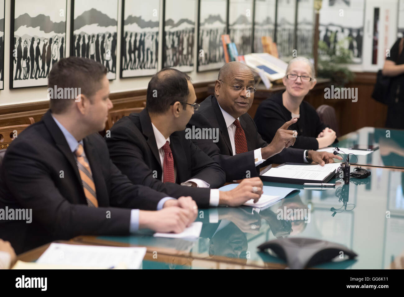 Texas state Sen. Rodney Ellis (speaking) and representatives of the ...