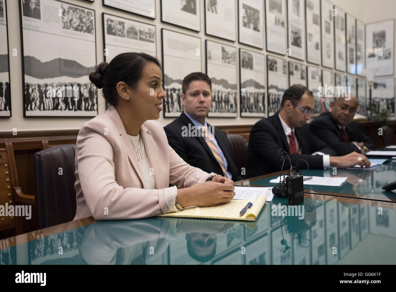 Texas state Sen. Rodney Ellis (right) and representatives of the ...