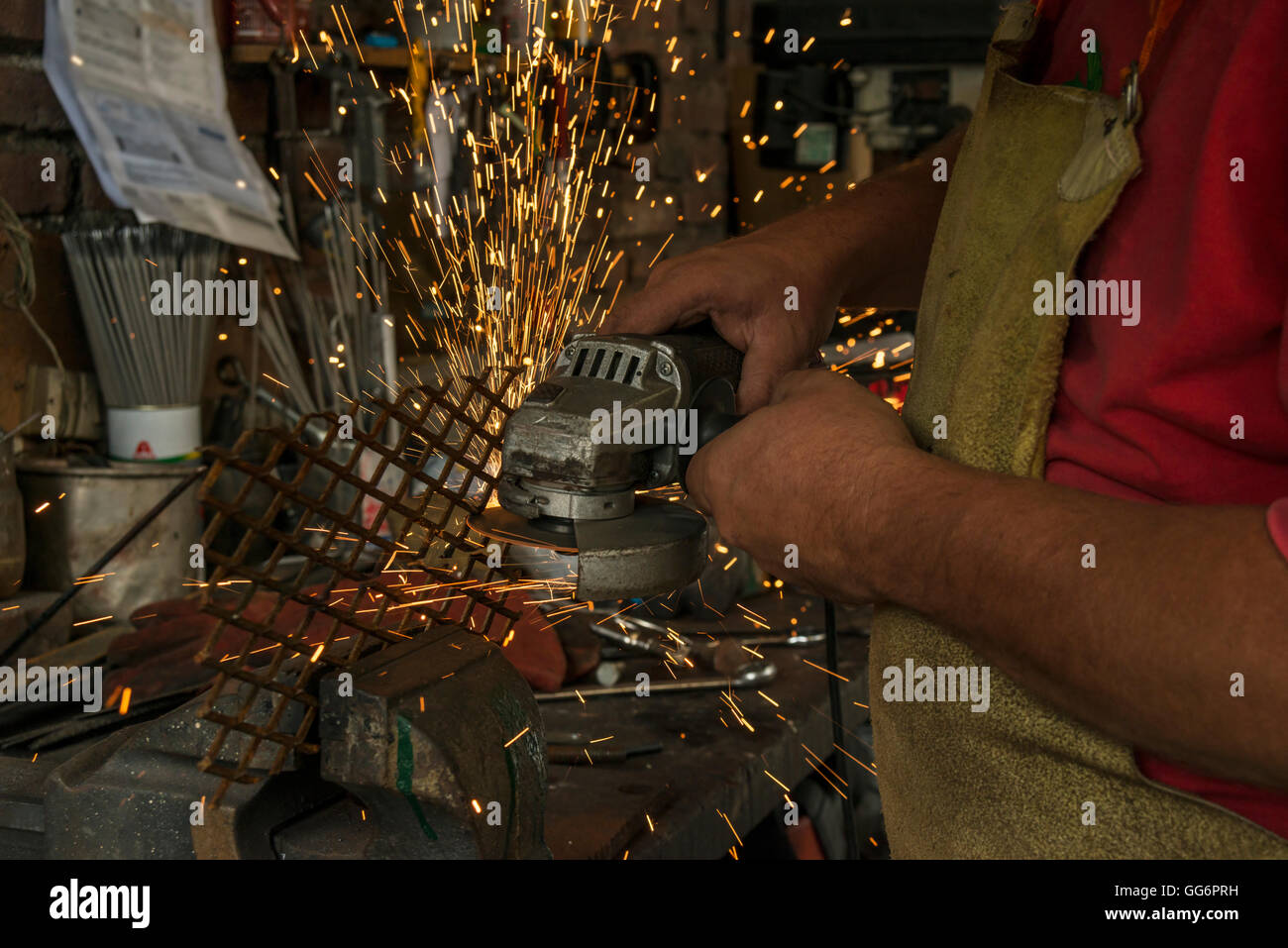 Worker grinding metal workshop close hi-res stock photography and ...