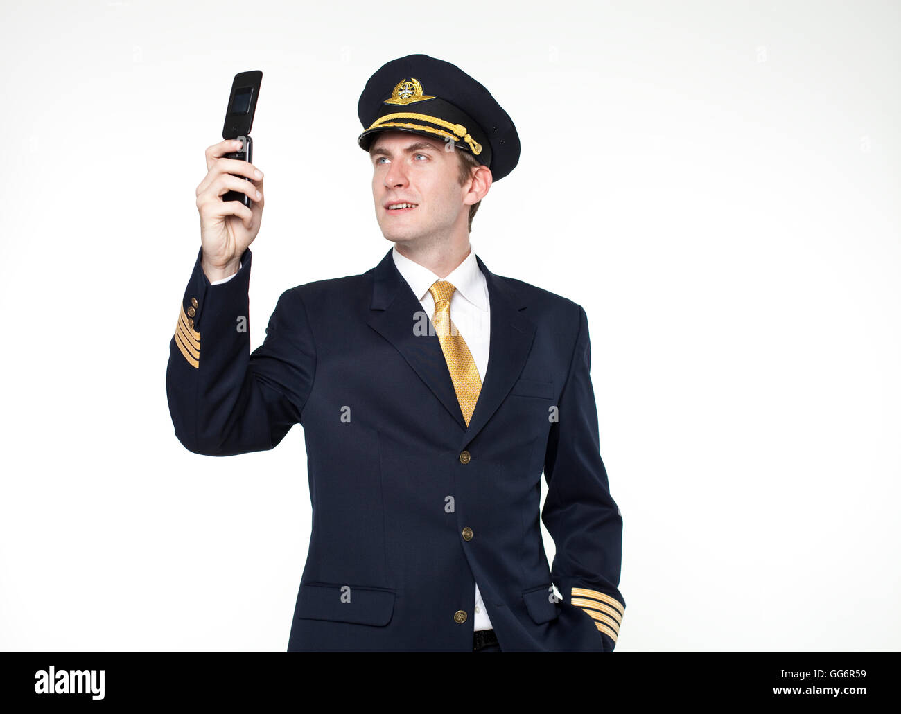Portrait of a young man in the form of a passenger plane pilot Stock ...