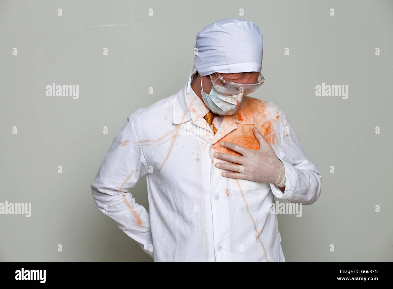Doctor in a bloody robe Stock Photo - Alamy