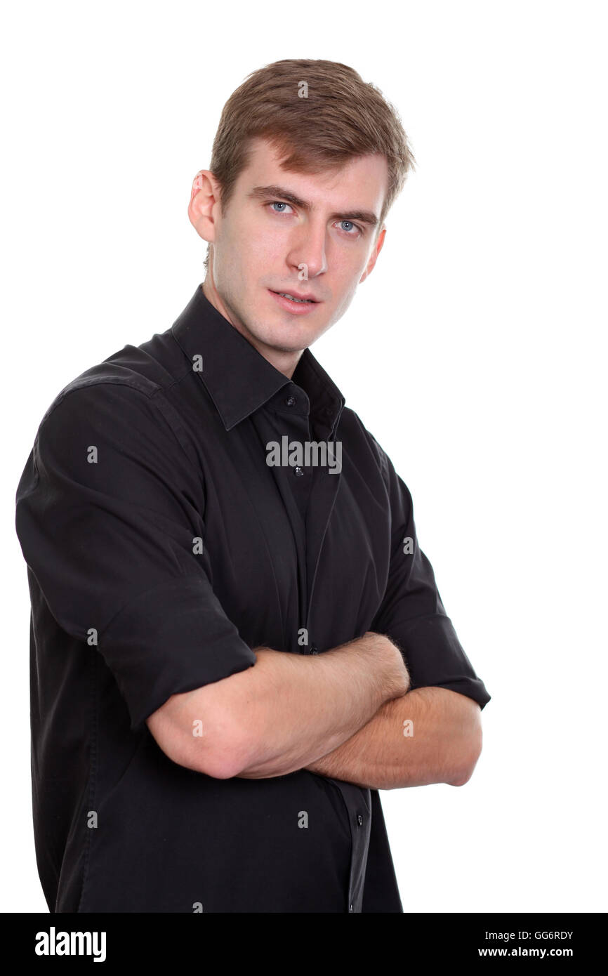 Portrait of a young man standing against white background Stock Photo ...