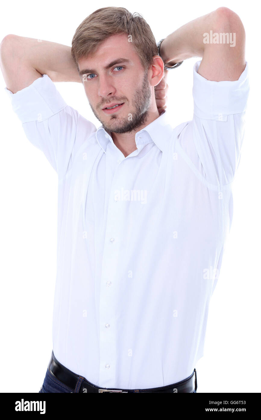 Portrait of a young man standing against white background Stock Photo ...