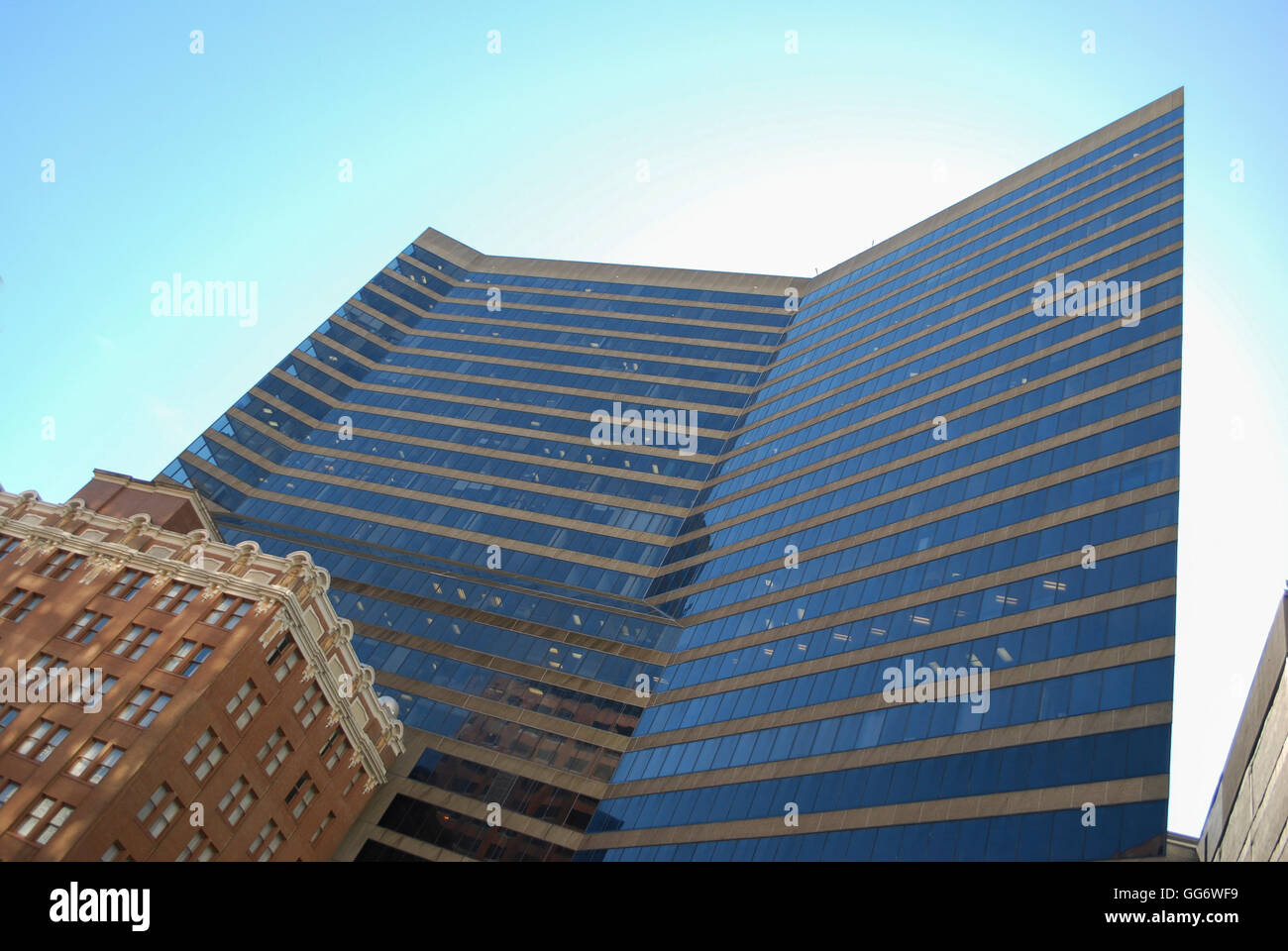 Distinctive building juxtaposed against an older one in New Orleans ...