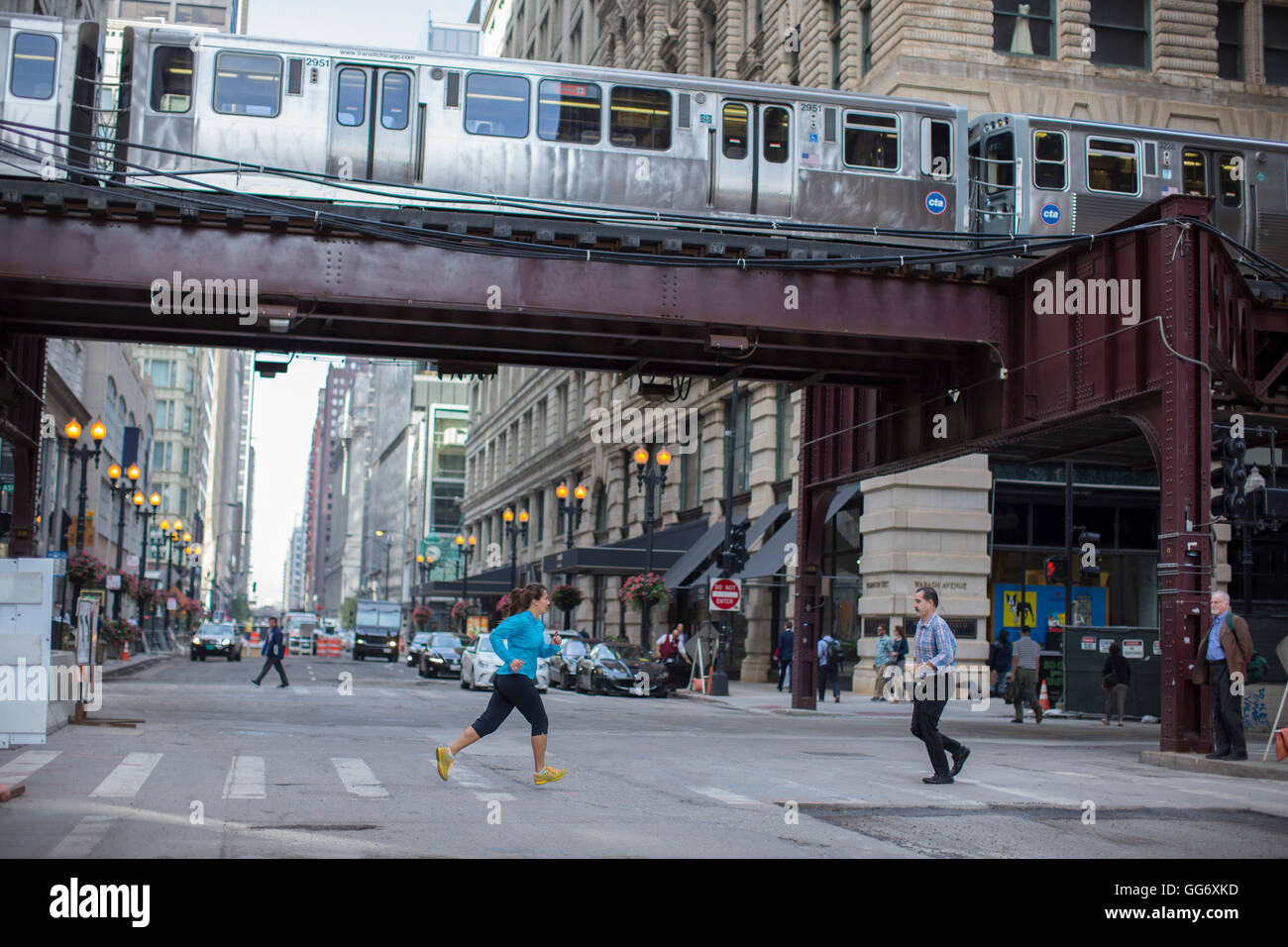 Women running street hi-res stock photography and images - Alamy