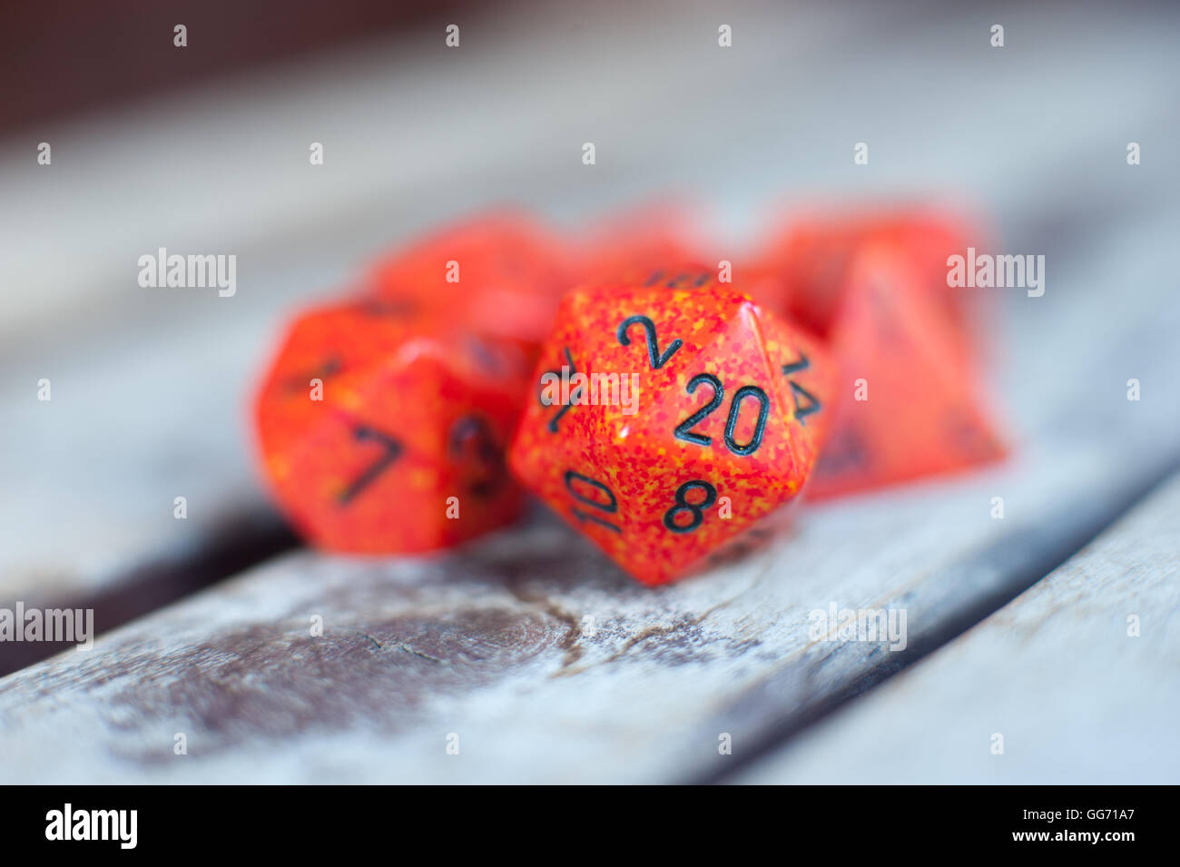 Group of different red role play dice with detail of Icosahedron dice ...