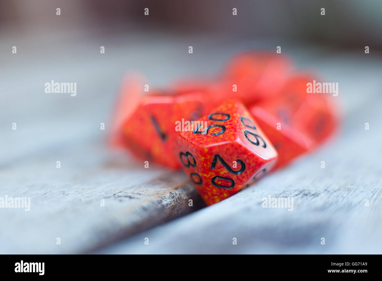 Group of different red role play dice with detail of hundreds ...
