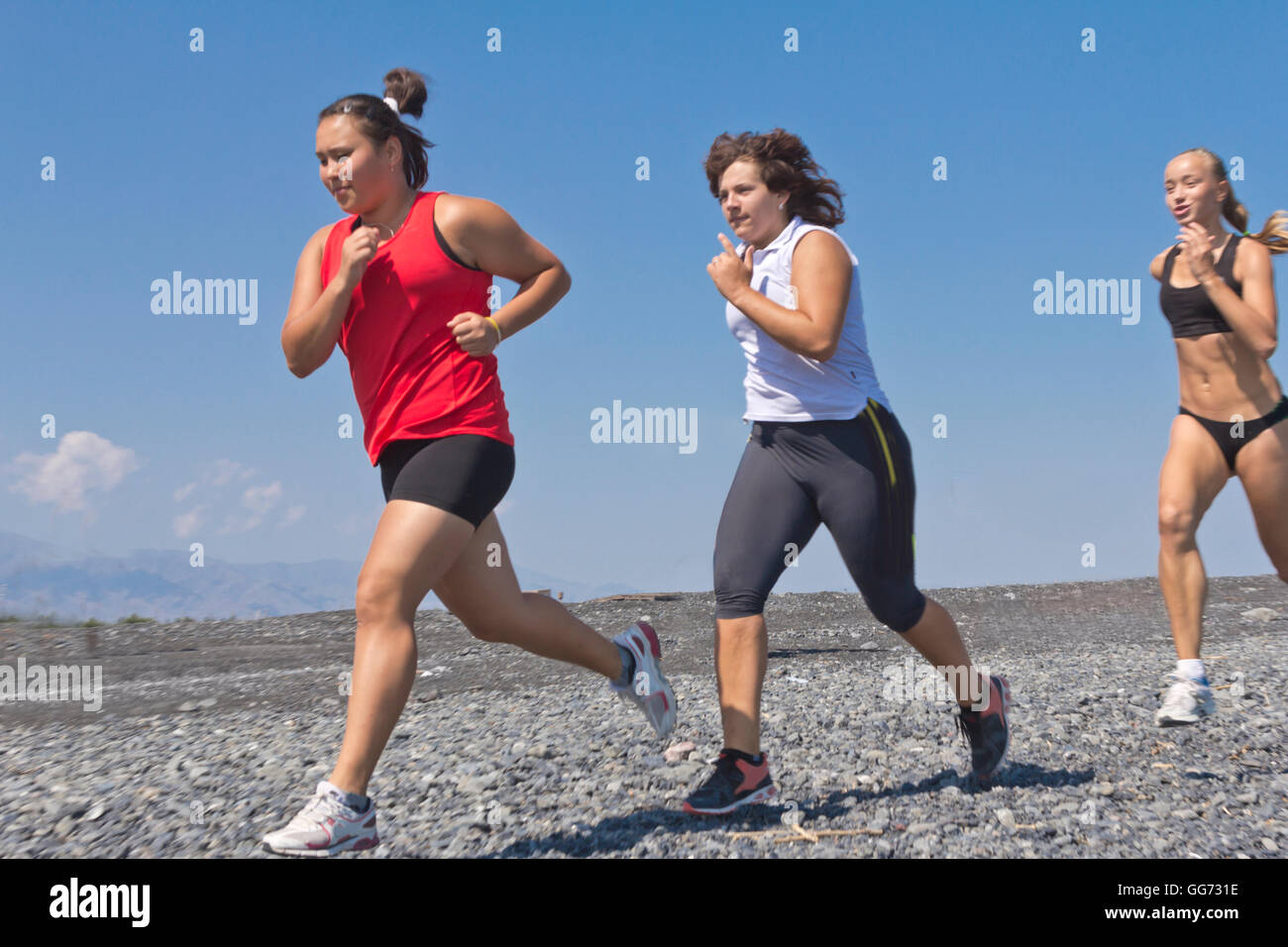 women running sea beach Stock Photo - Alamy