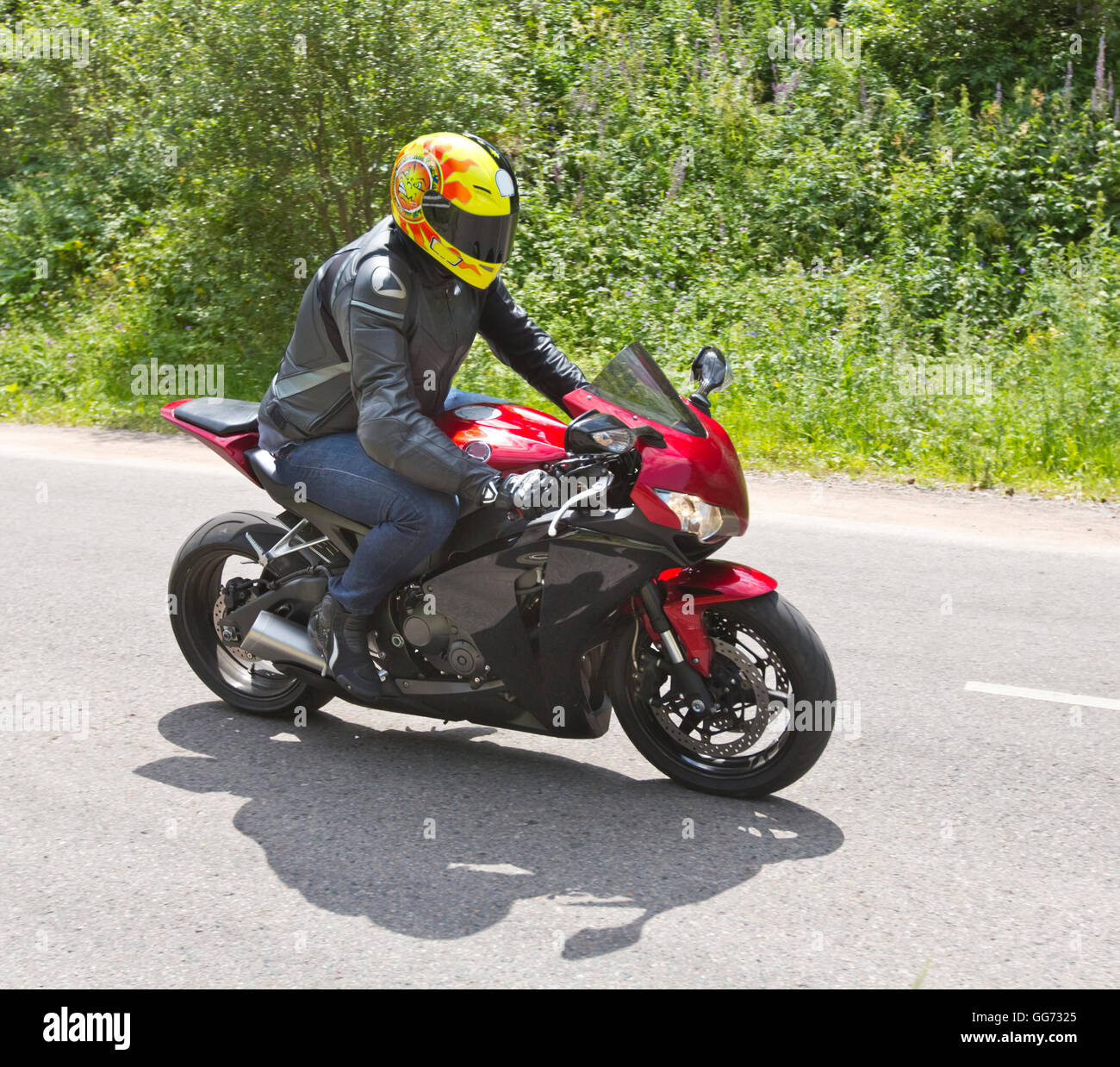 motorcyclist biker fast riding Stock Photo - Alamy