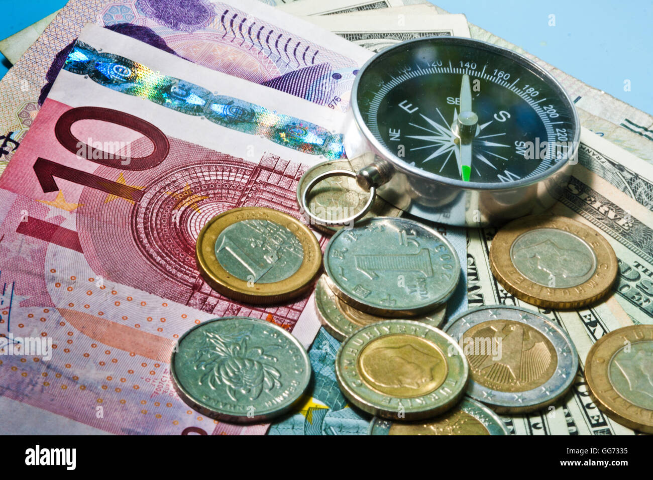 cash money concept compass Stock Photo - Alamy