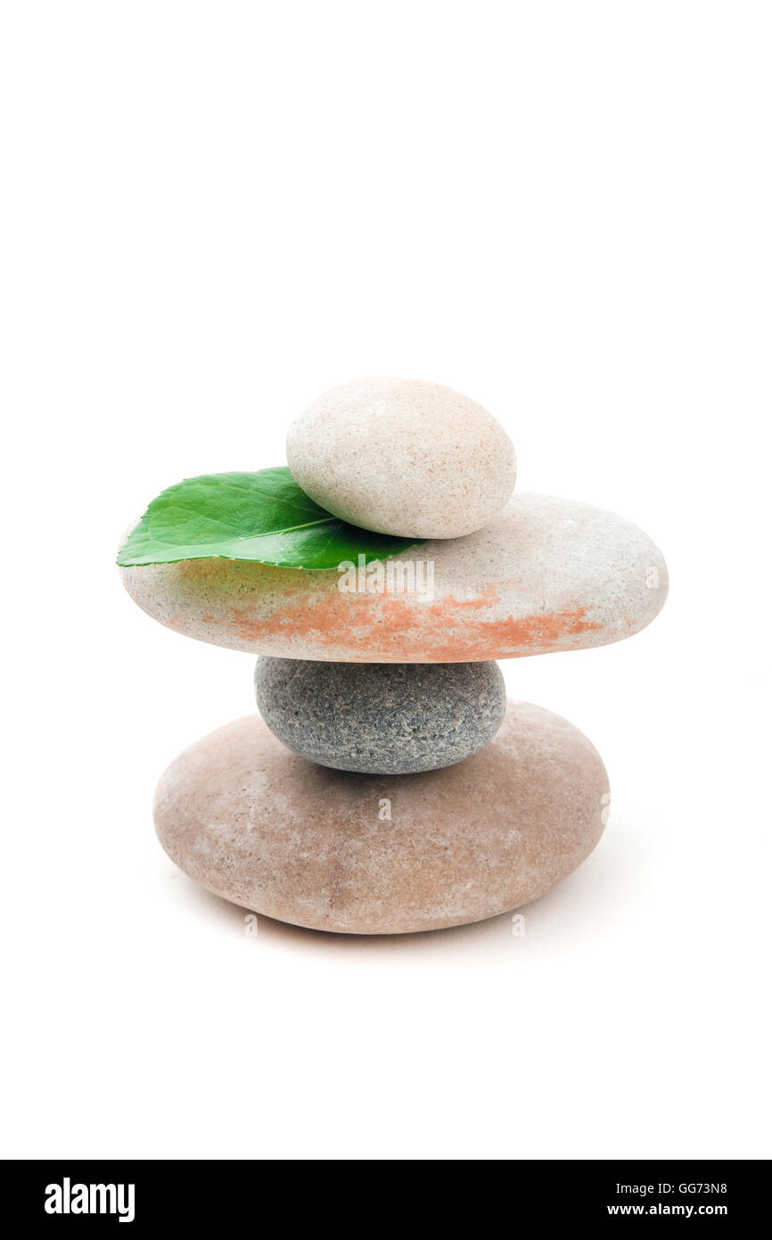Pile of balancing pebble stones, like ZEN stone, isolated on white ...