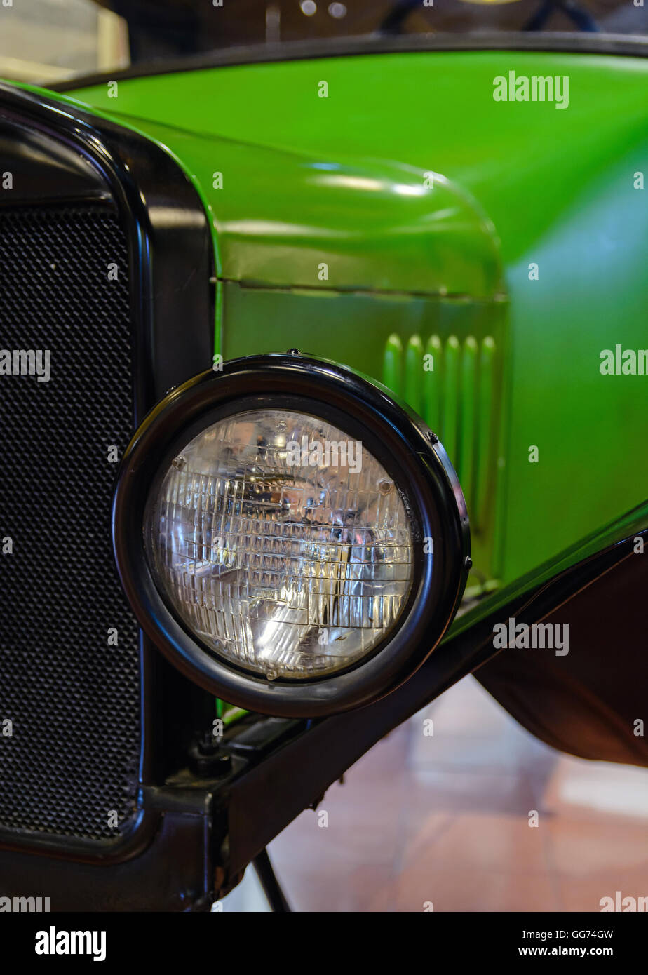 radiator and a large black lamp old green car Stock Photo - Alamy