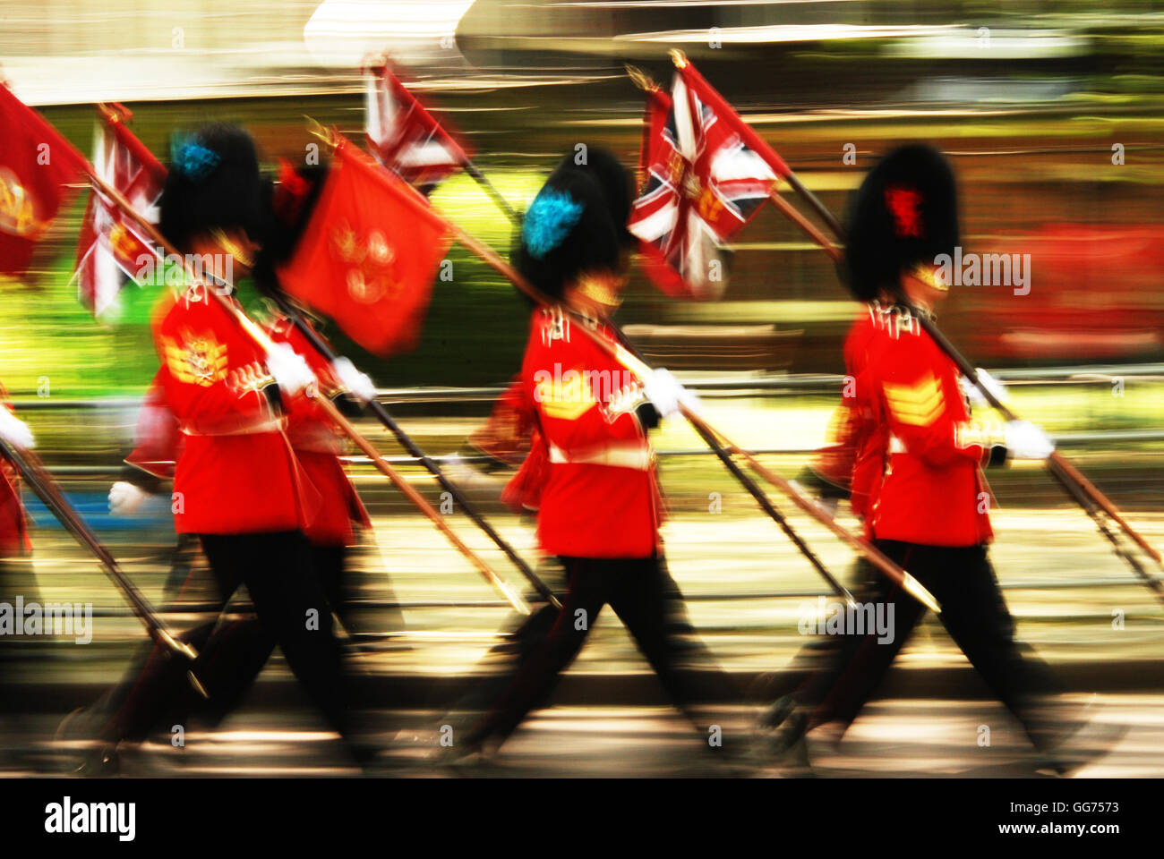 Guards marching near Buckingham Palace carrying the Colours ...