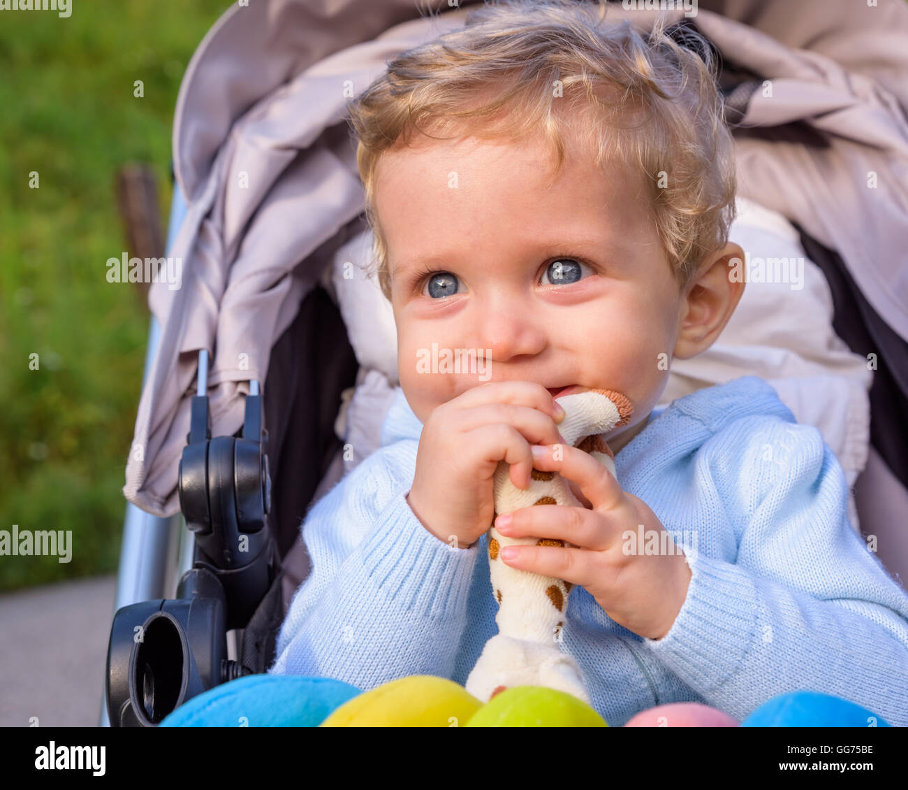 Baby close up in stroller hi-res stock photography and images - Alamy
