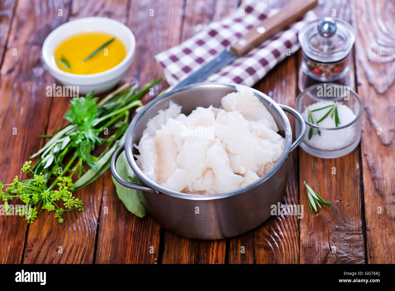raw fish fillet in bowl and on a table Stock Photo - Alamy