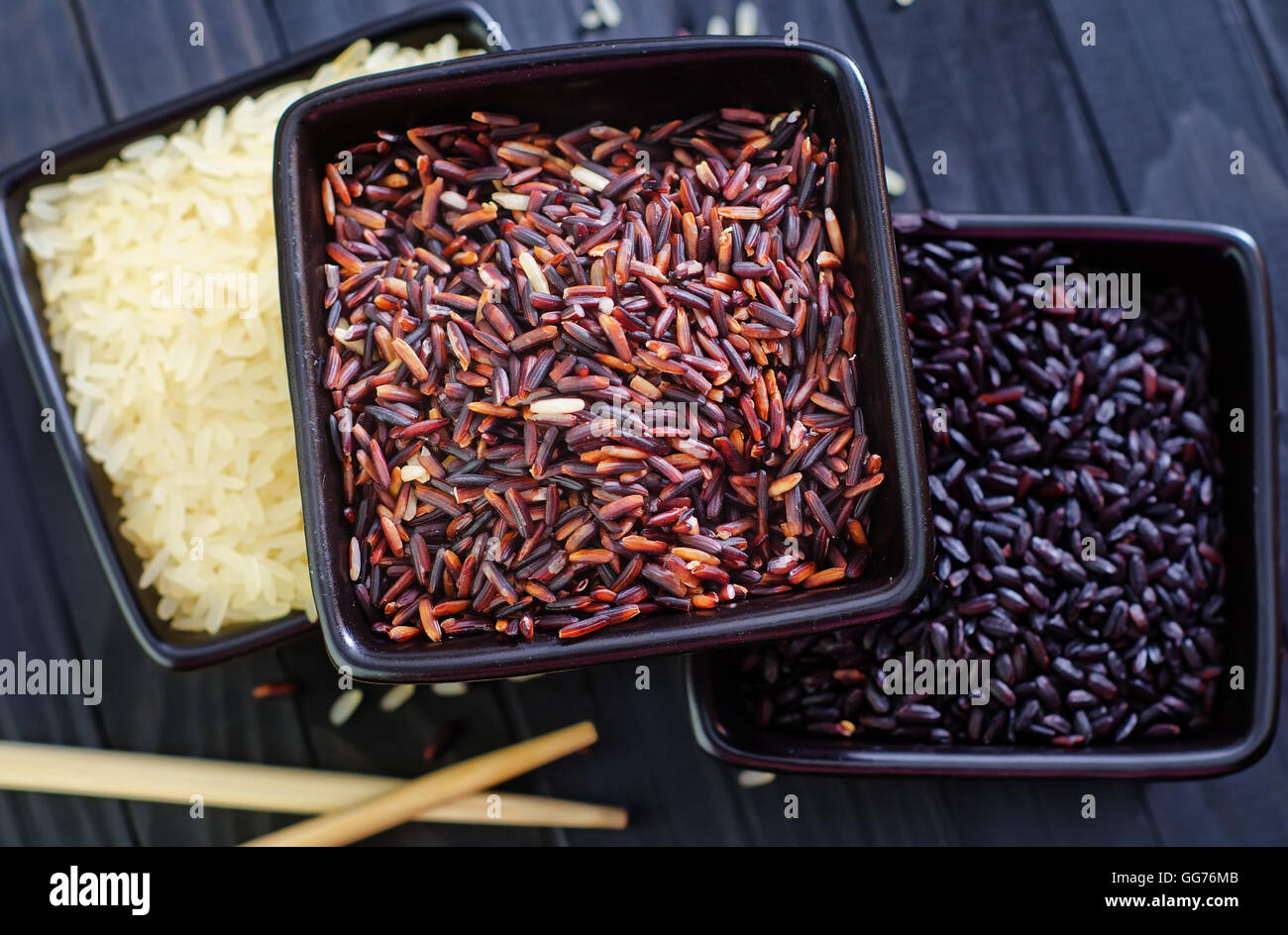 raw rice in bowls Stock Photo - Alamy