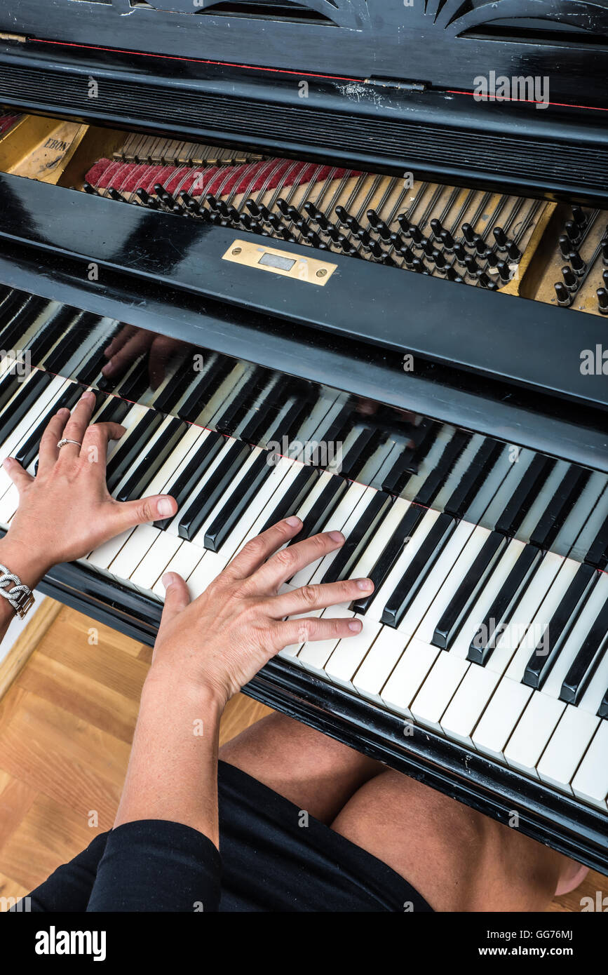 Hands of an elegant classical musician woman playing on piano Stock ...