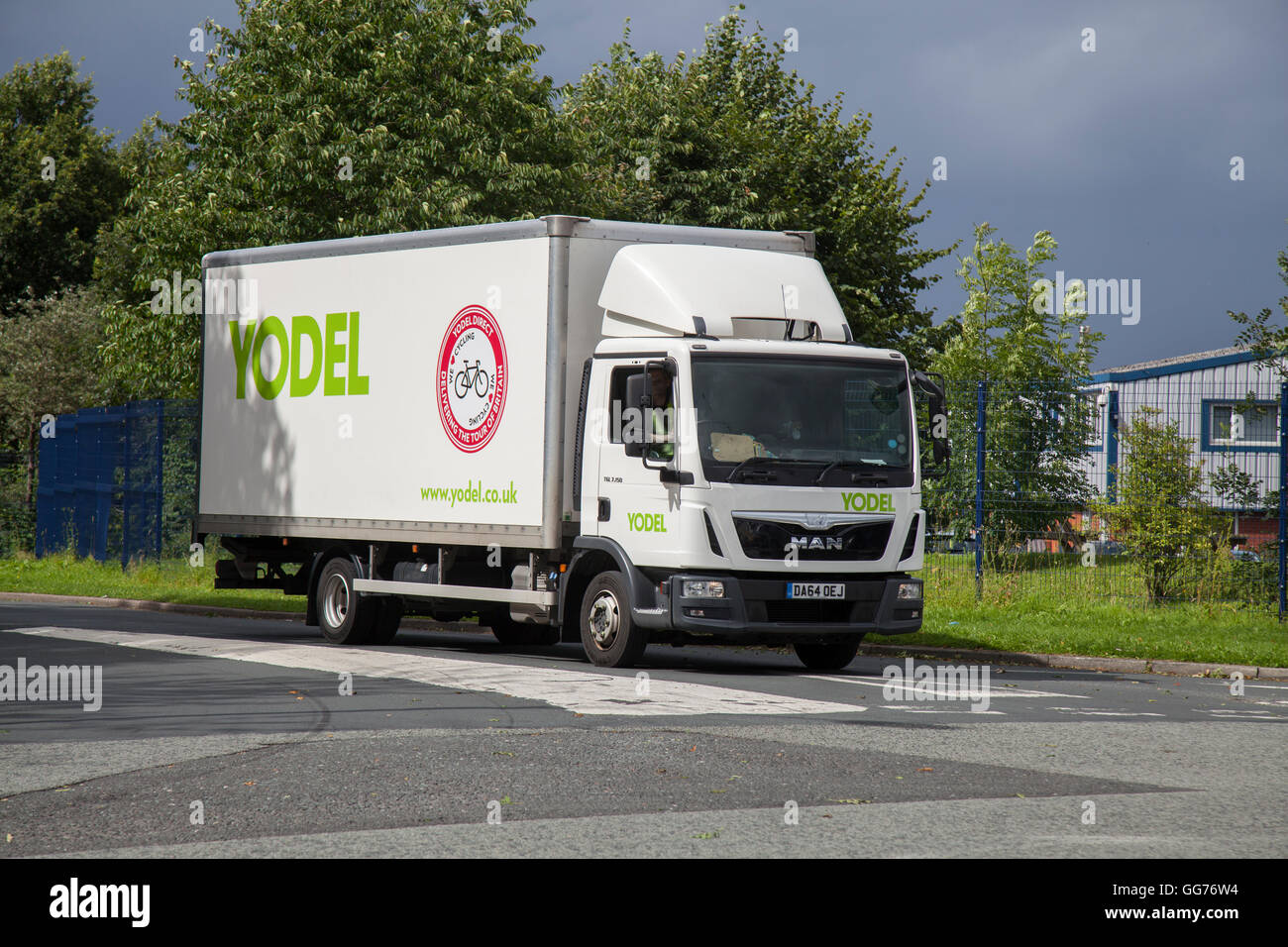 Yodel delivery driver and vehicle en-route in Preston, Lancashire, UK ...