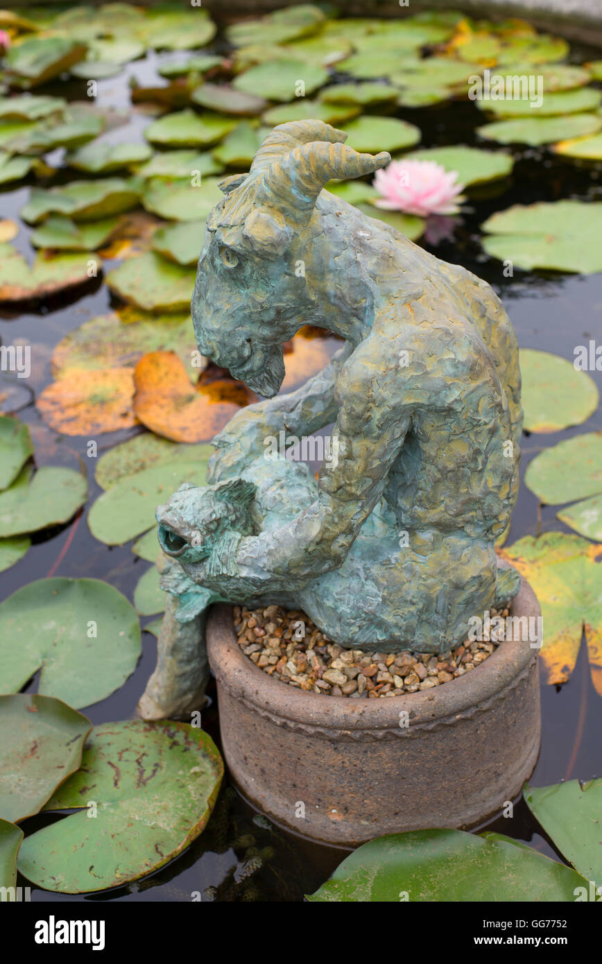 Bronze goat water fountain Stock Photo - Alamy