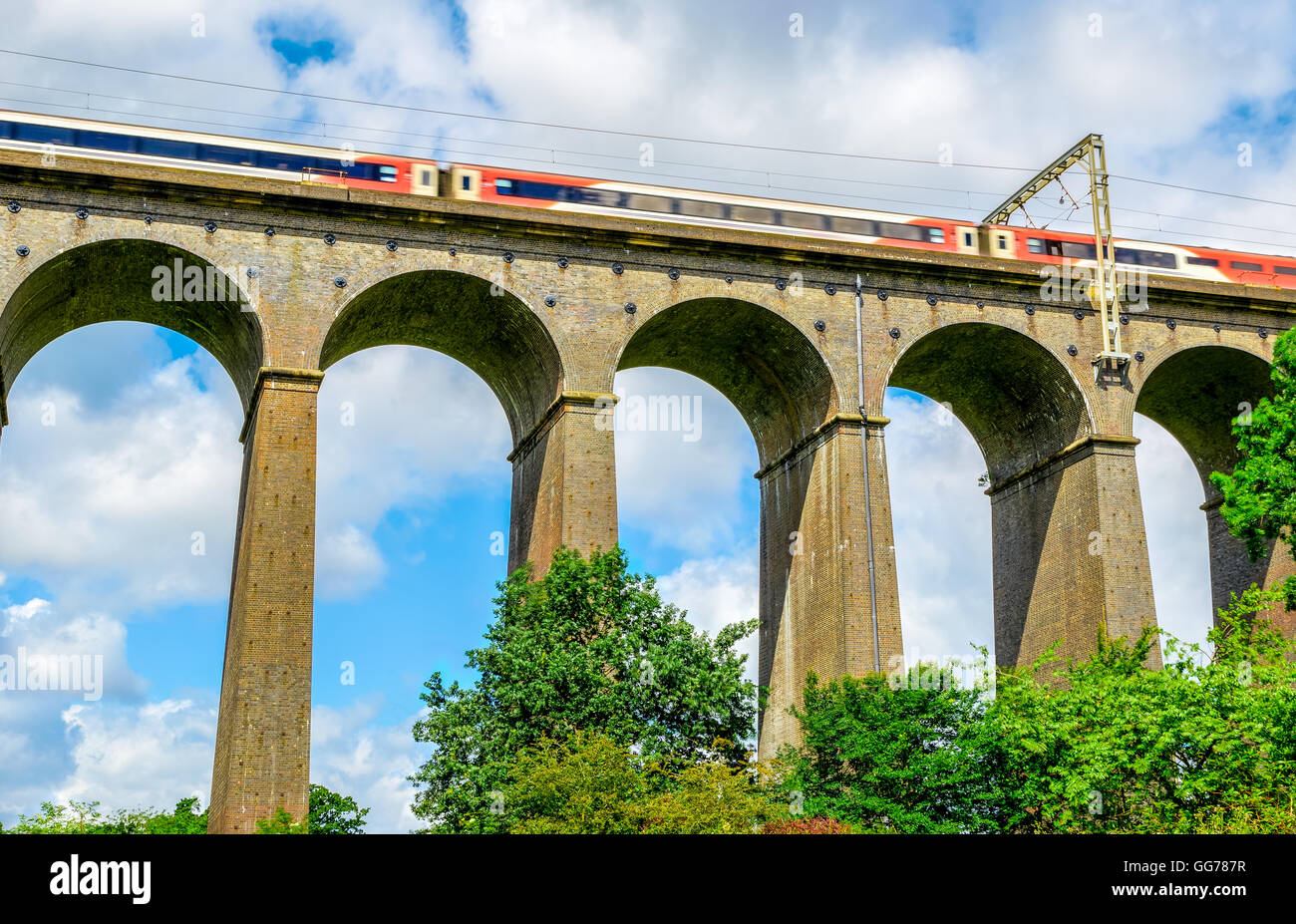 Digswell Viaduct (Welwyn Viaduct) with train in motion. It’s located ...